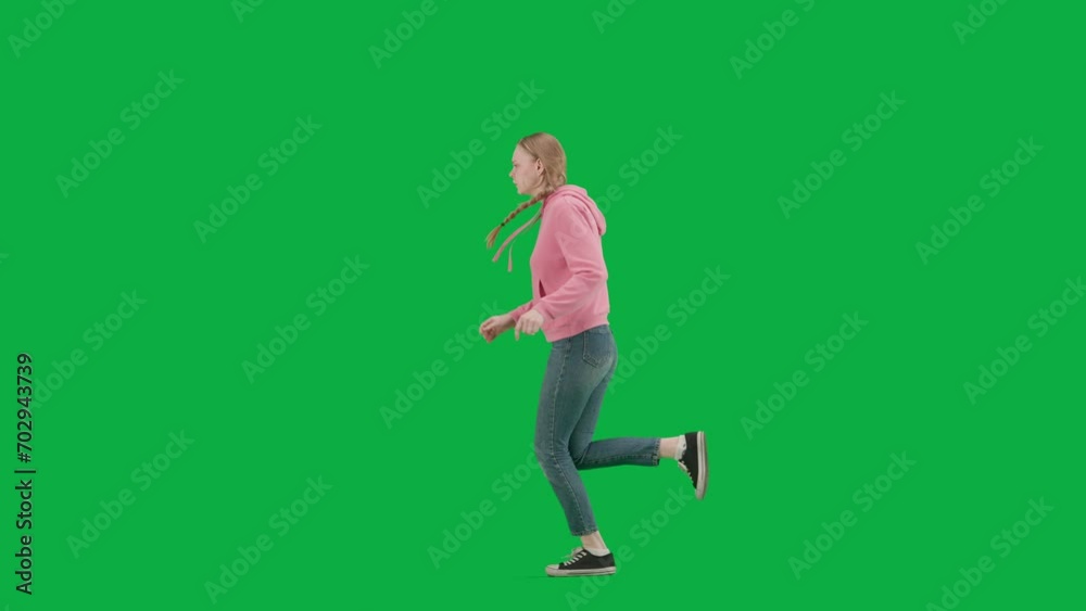 Portrait of victim on chroma key green screen background. Young girl ...