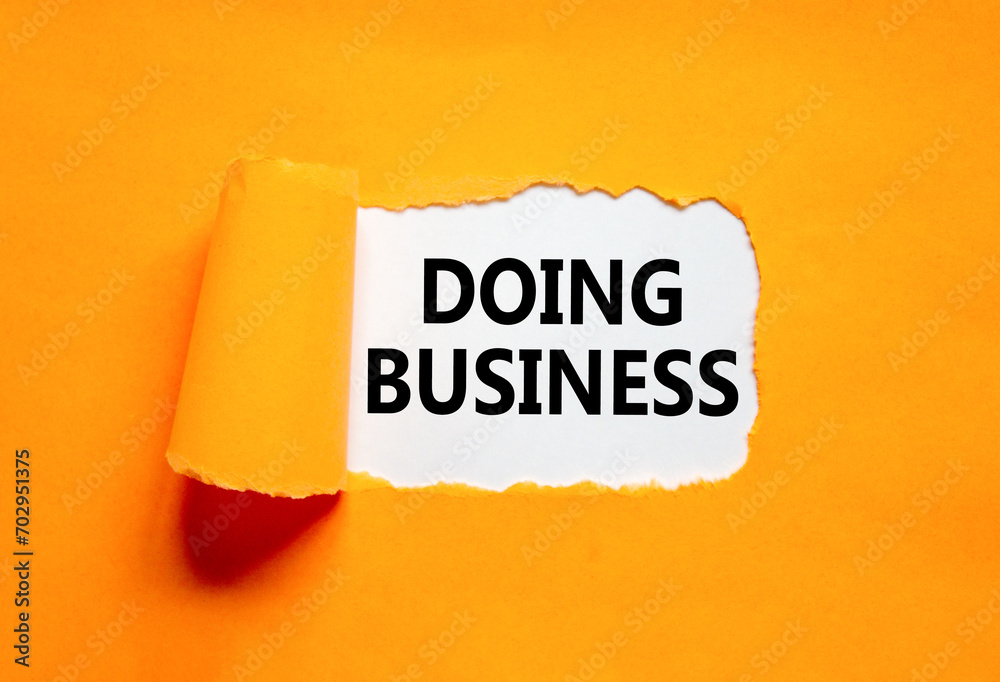 Doing business symbol. Concept words Doing business on beautiful white ...