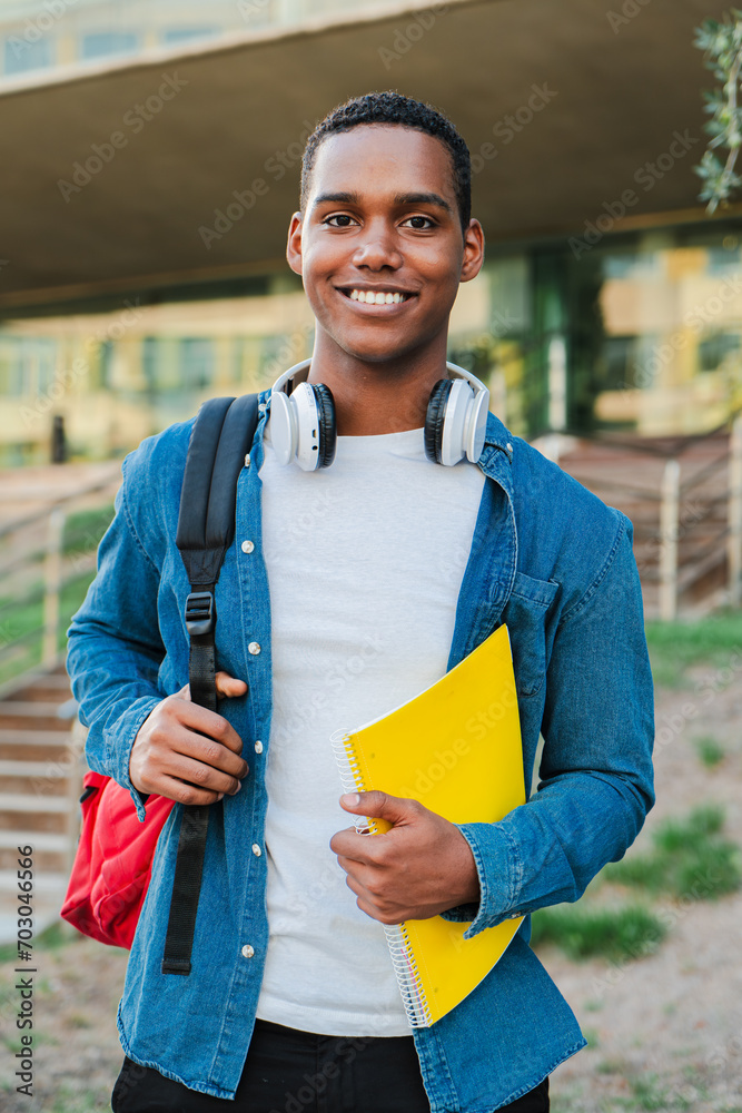 Vertical individual portrait of a african american student young man ...
