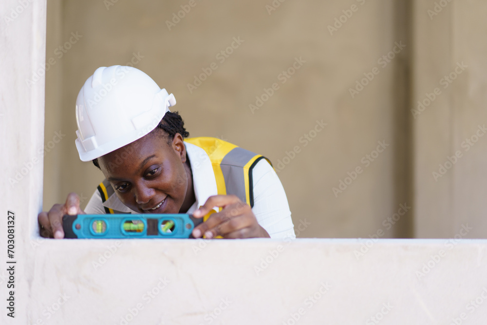 Professional American - African black ethnicity engineer using the ...