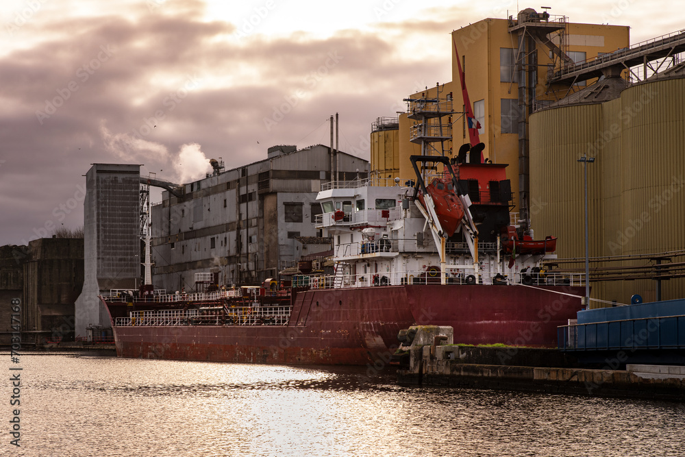 Large Ro-Ro (roll on-roll off) cargo ship in the port of Saint-Nazaire ...