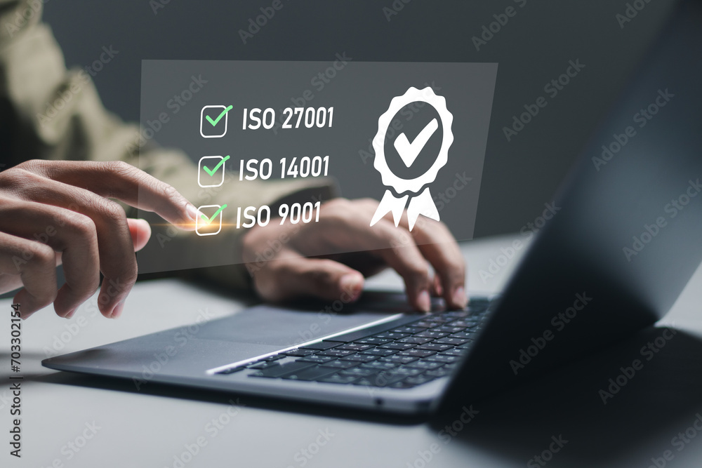 ISO concept. Businessman makes a checklist for standards iso 27001 ...