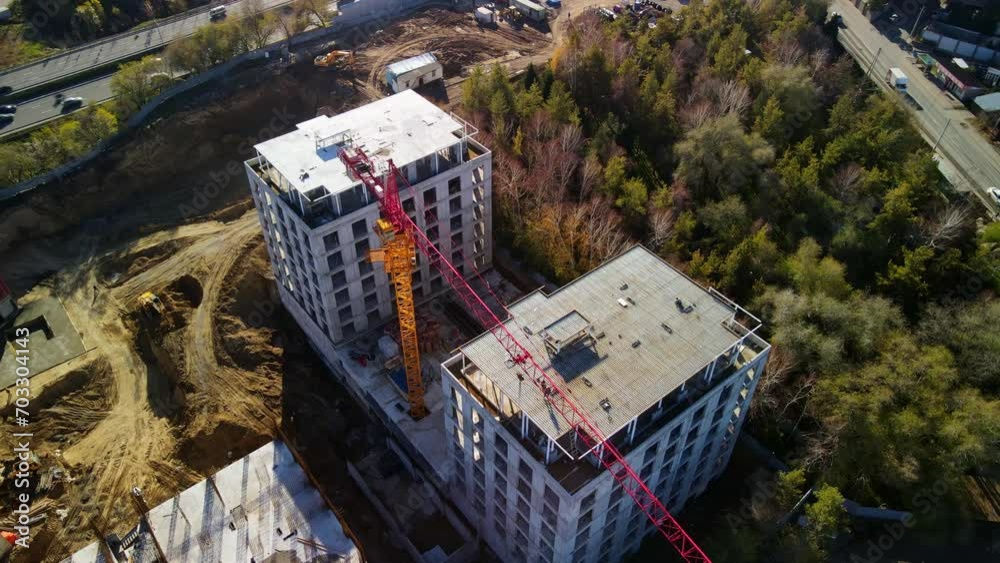 An aerial view of the construction of a residential building. The ...