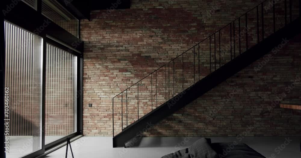 Modern apartment with black stair and large sliding windows ...