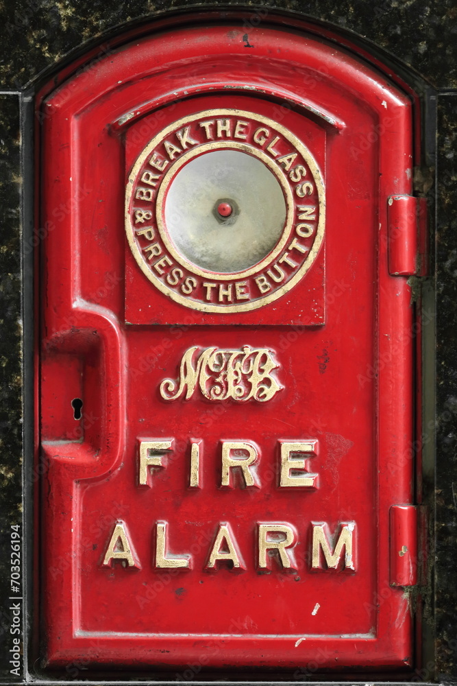 Red painted, cast iron fire alarm box from the 1900s of the MFB ...