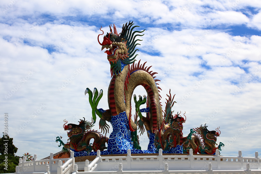 Dragon and lion dance against with Dragon Status, Chinese Culture Stock ...