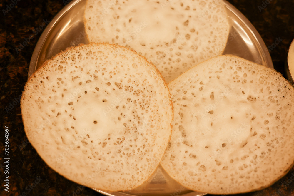 Appam, Kerala breakfast food egg curry or hot and spicy chickpea Masala ...