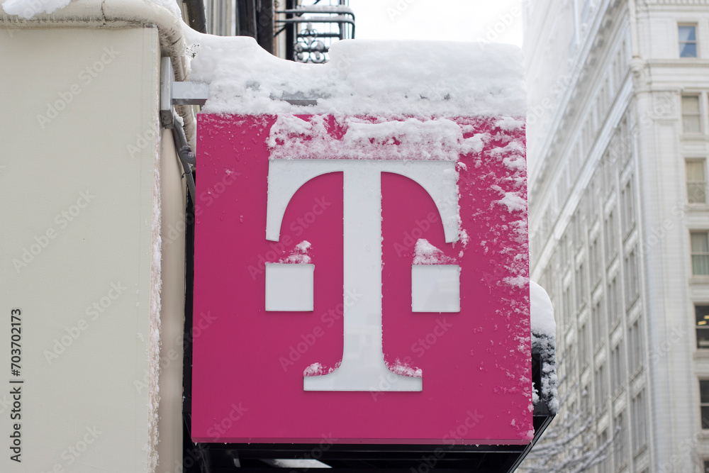 Portland, OR, USA - Feb 23, 2023: Snow-capped T-Mobile sign is seen ...