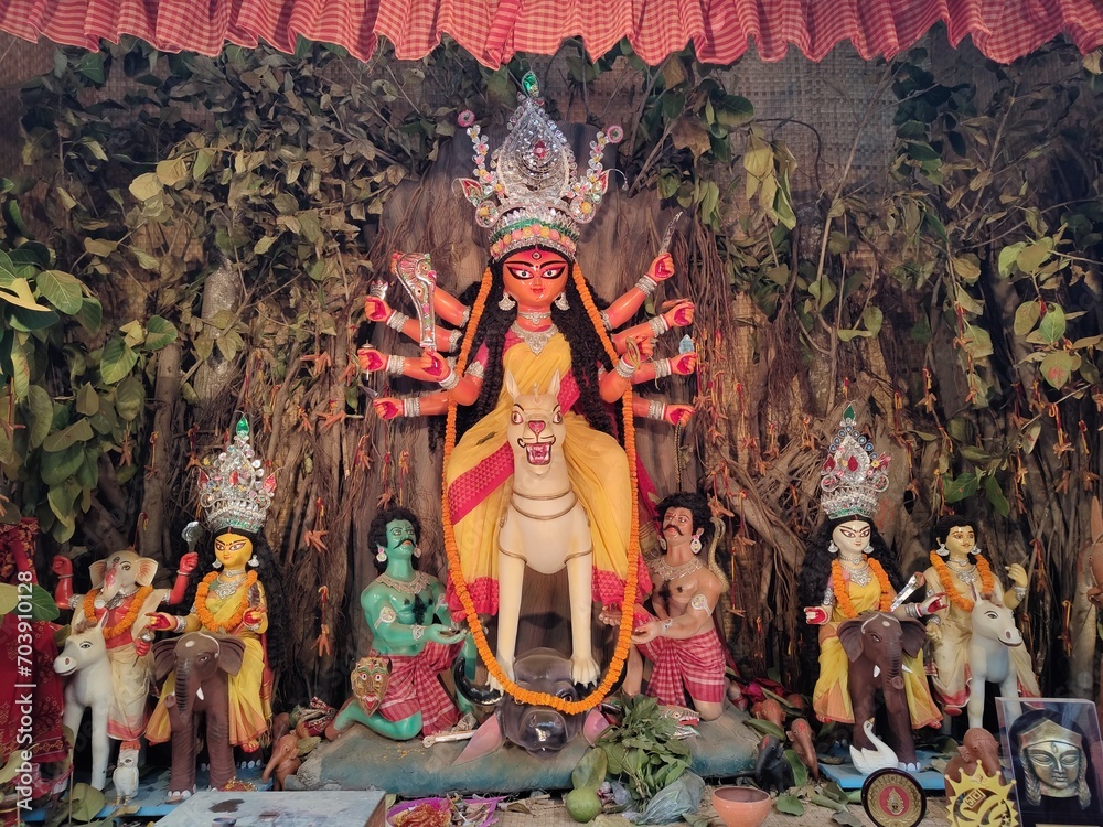 Idol of Goddess Devi Durga at a decorated puja pandal in Kolkata, West ...