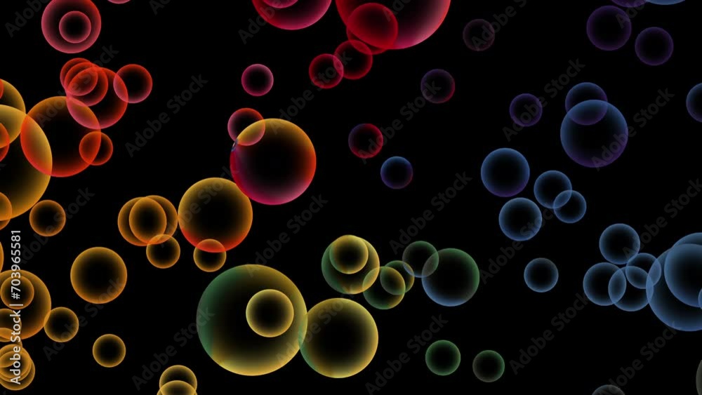 Abstract moving colorful flying spheres on black. Colorful rainbow balls in different sizes ...