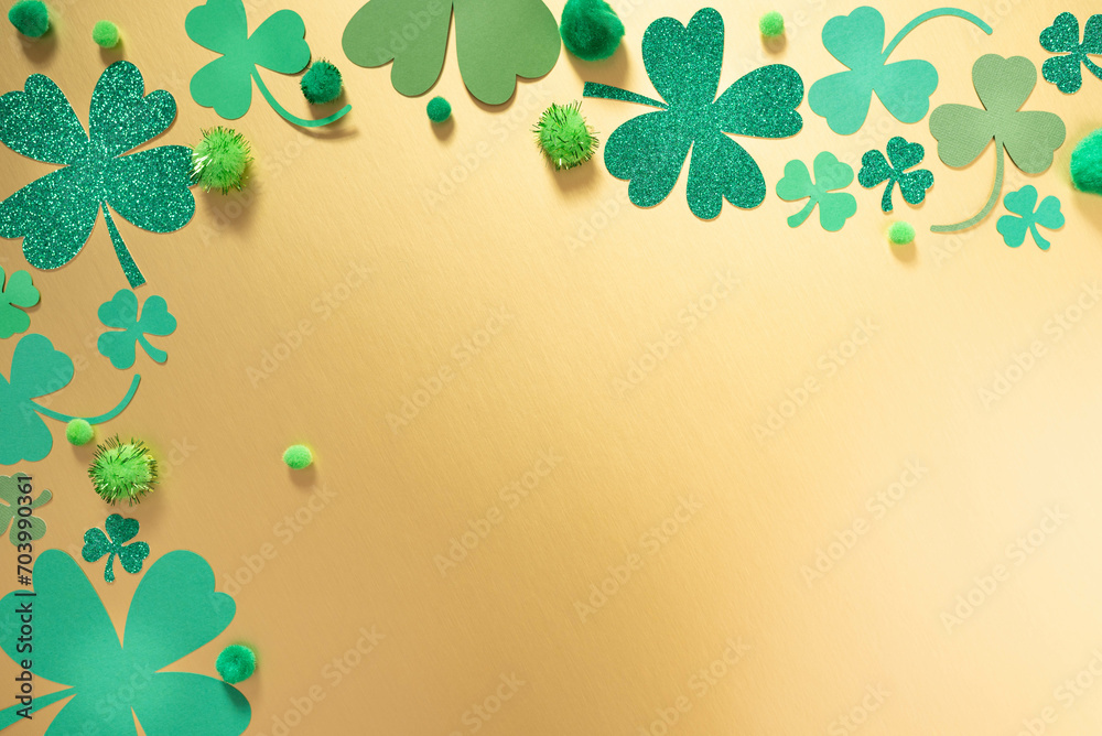 St. Patrick Day themed gold background with shamrock clover of various ...