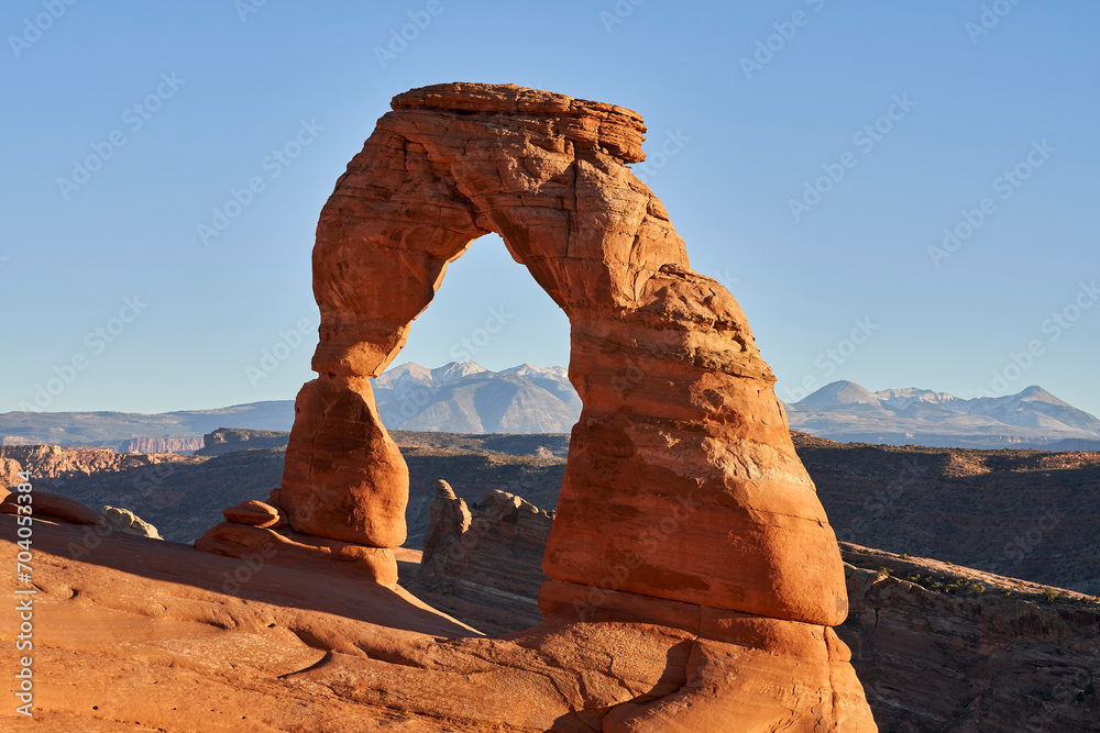 The delicate arch in Arches national park is 52 feet tall, and is a ...
