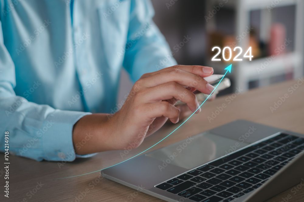 Business growth 2024 concept. Businessman analyze new year trend of ...