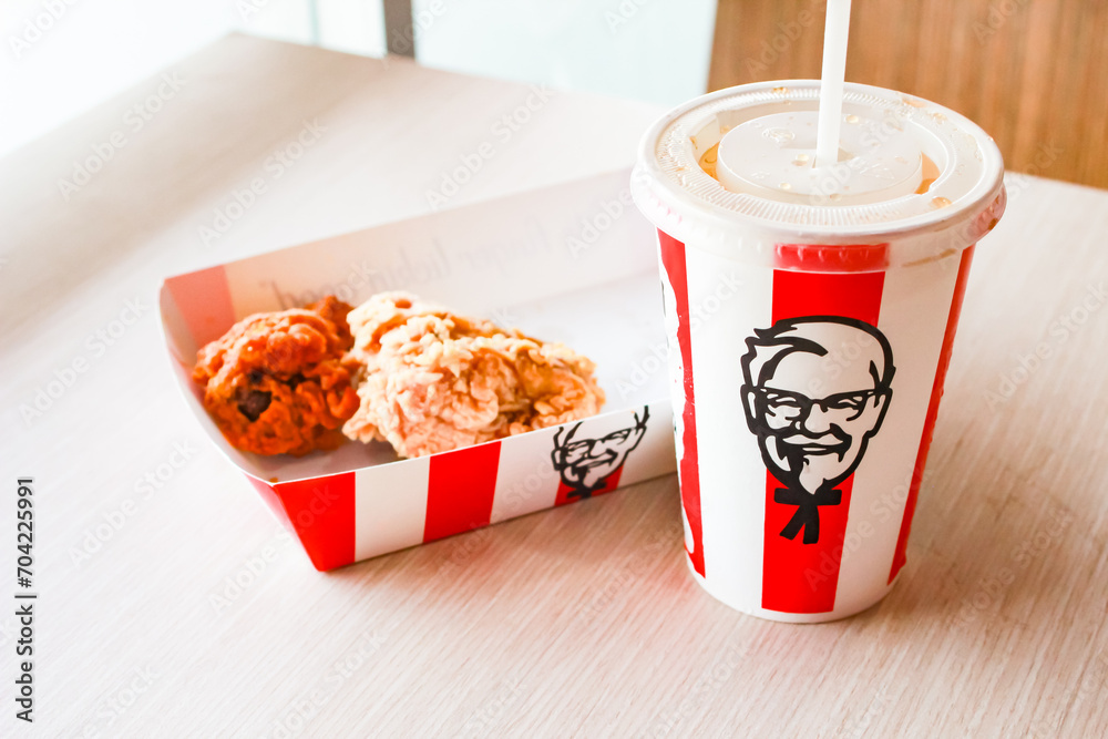 Bangkok, Thailand - January 07 2024 - Two pieces of KFC fried chicken ...