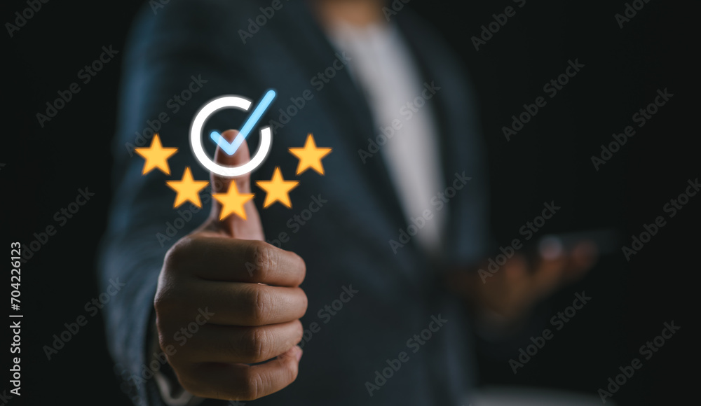 Hand with thumb up and shows the sign of the top service Quality ...