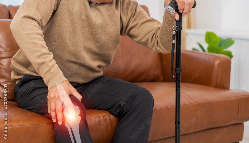 Sick unhappy senior adult elderly asian man touching her muscle injury ...