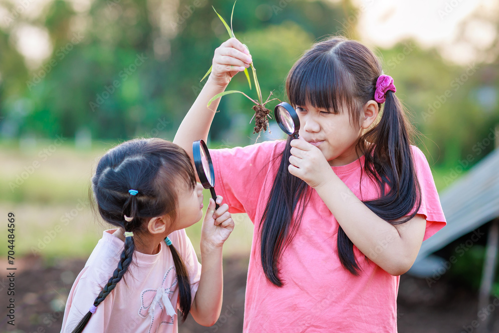 Little child having outdoor science lesson exploring nature. Cute and ...