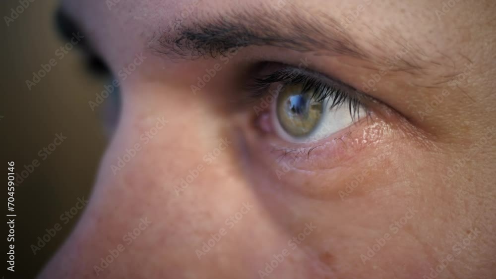 Eye of a person looking at screen. MACRO Reflection in eyes from TV ...