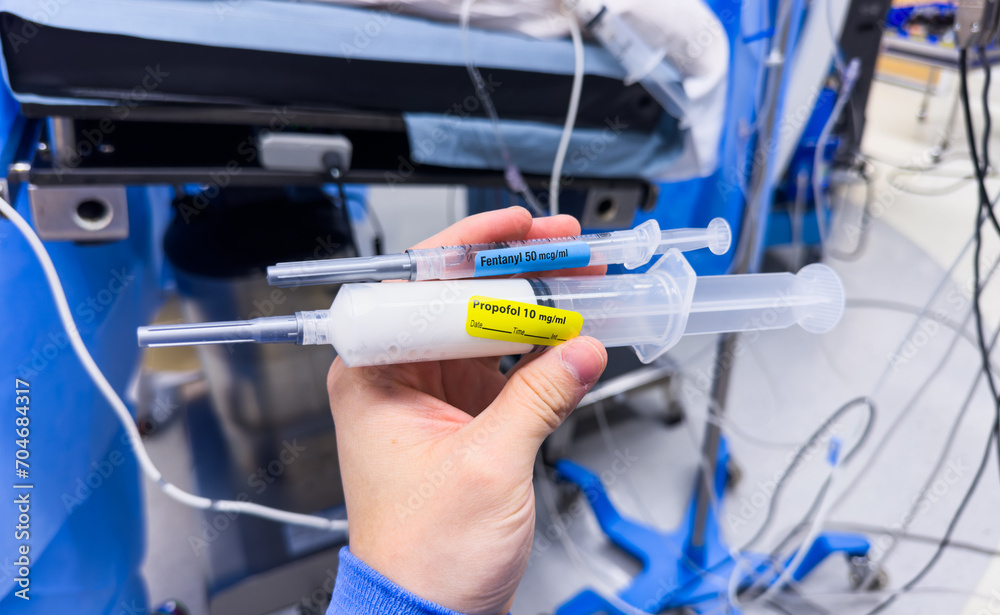 Medical vials, syringes, and needles representing hospital drugs and ...