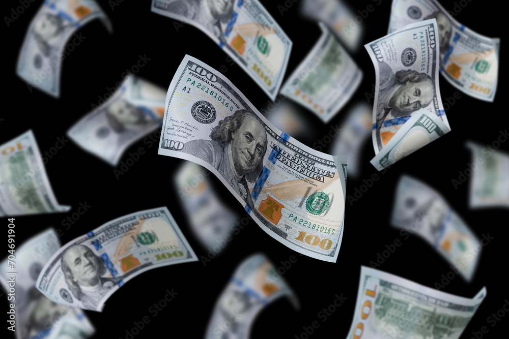 Flying dollars banknotes isolated on dark background. Money is flying ...