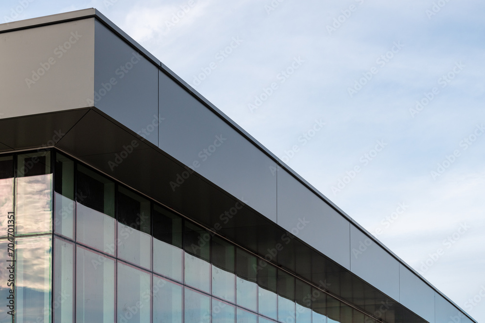 The exterior wall of a contemporary commercial style building with ...