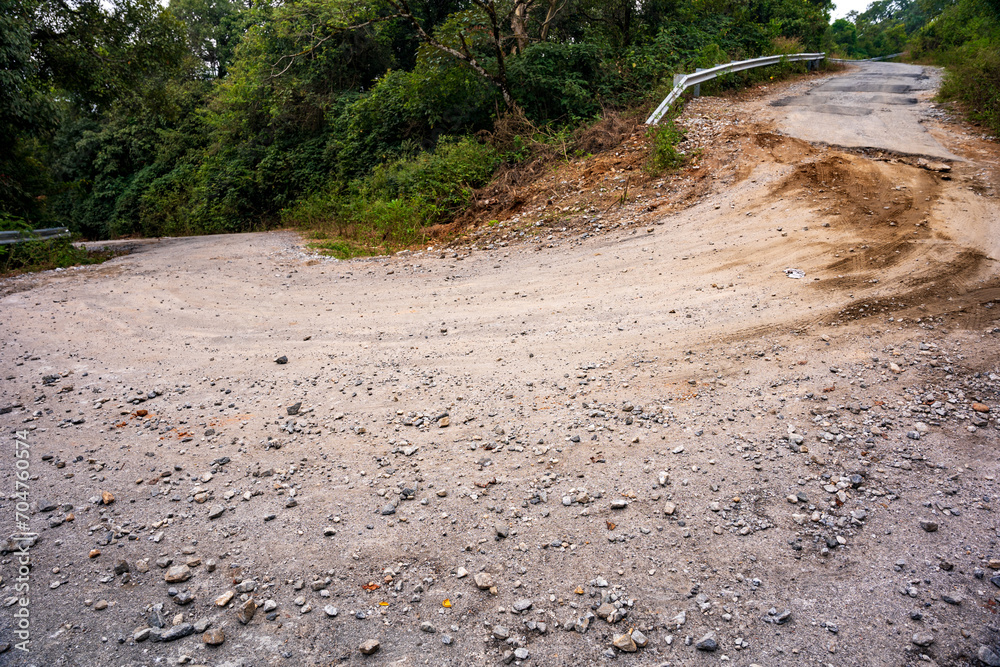 Bad country road. The asphalt road is full of holes and cracks Stock ...