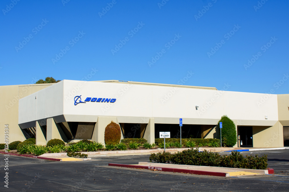 Boeing logo, sign on company office. The Boeing Company is an American ...