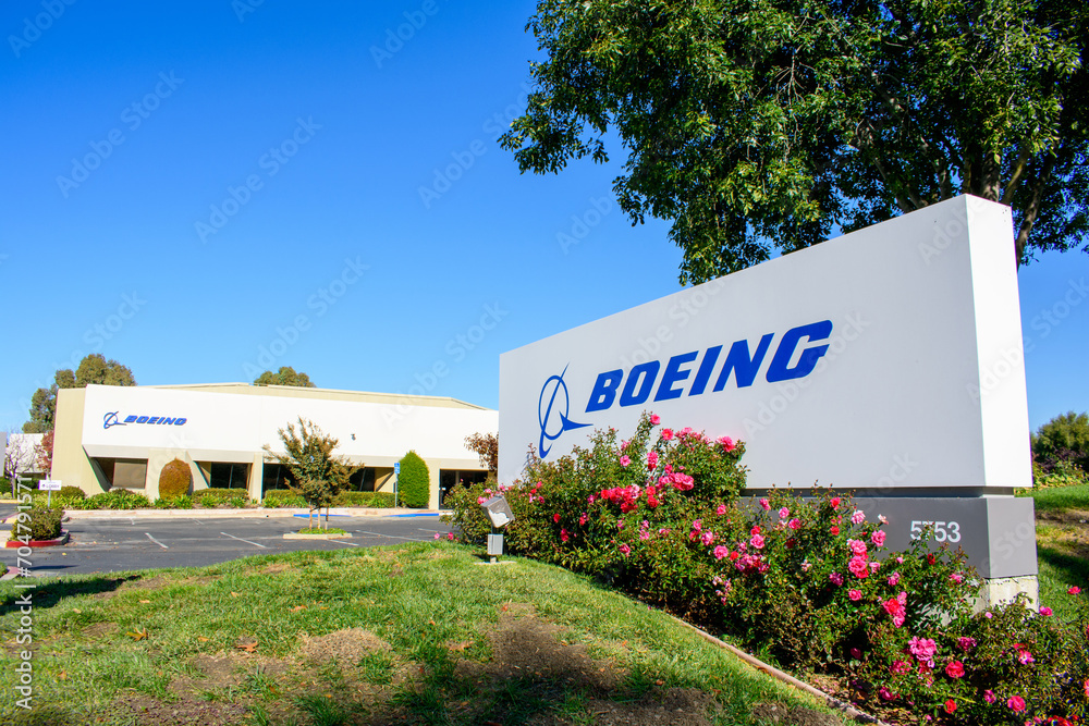 Boeing logo, sign on company office. The Boeing Company is an American ...