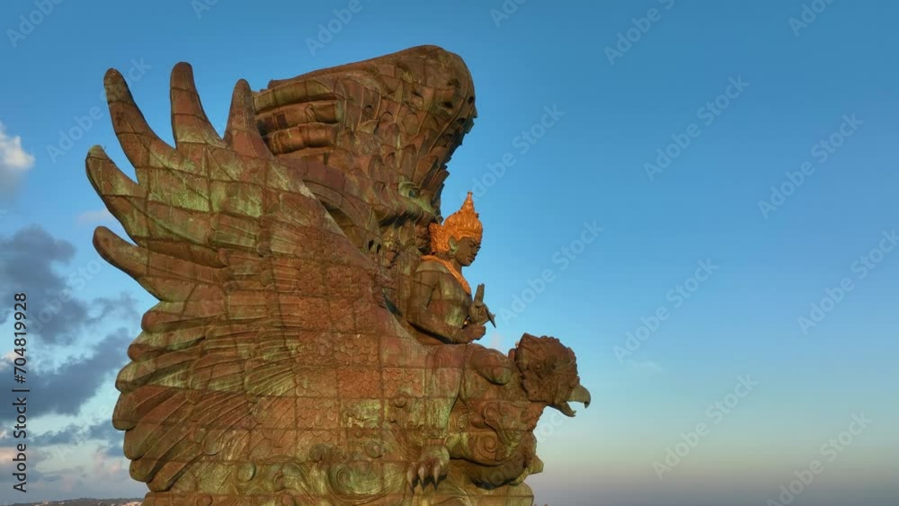 Drone video.Statue of Hindu god Garuda Vishnu Kenkhana With blue sky ...