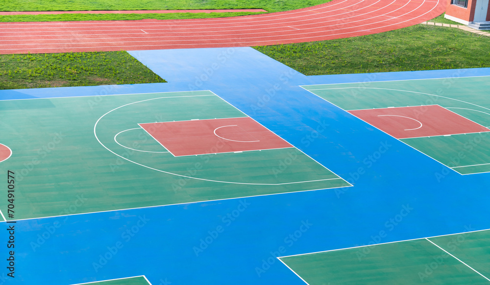 School sport field with basketball court and track Stock Photo | Adobe ...