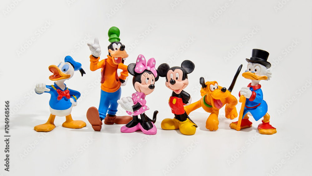 Figurines of Walt Disney cartoon characters in white studio Stock Photo ...