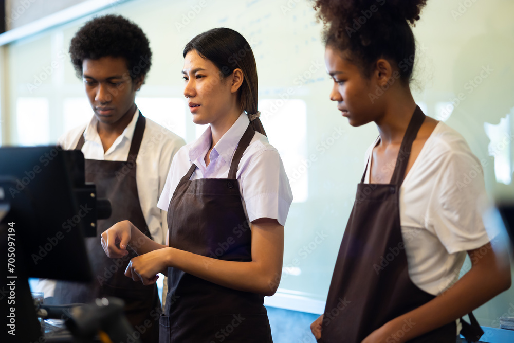 Barista coffee training workshop. Barista learning make coffee by espresso machine. Group ...