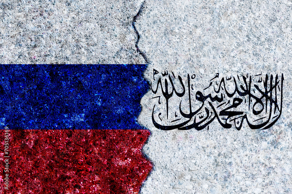 Russia and Taliban painted flags on a wall with a crack. Russia and ...