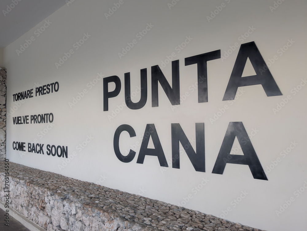 Sign Punta Cana come back soon in different languages by the entrance ...