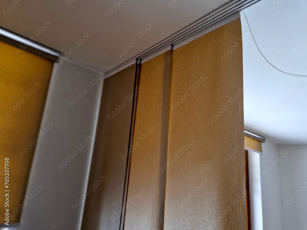 extendable hanging blind is a dividing partition made of textile beige ...