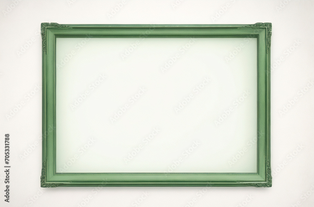 Realistic empty green picture frame. Poster in the frame on the wall ...