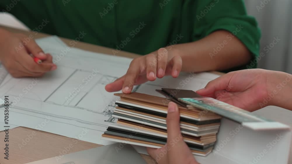 Skilled interior designer using architectural equipment draw blueprint ...