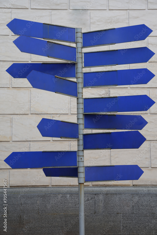 mock up. Signpost with many, a lot blank template signs on building ...