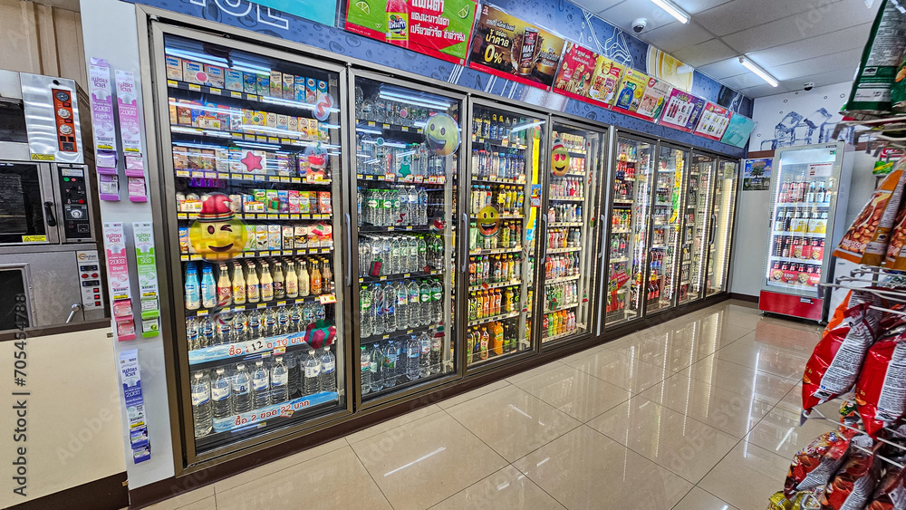 Drink products in supermarket Variety of drinks on shelves in ...