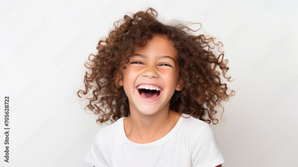 Happy african-american child girl smiling to camera over white ...