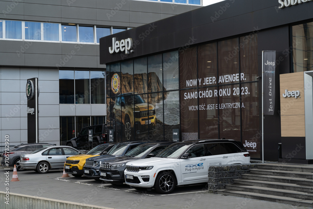 Jeep car dealership building with logo sign. American brand of vehicles ...