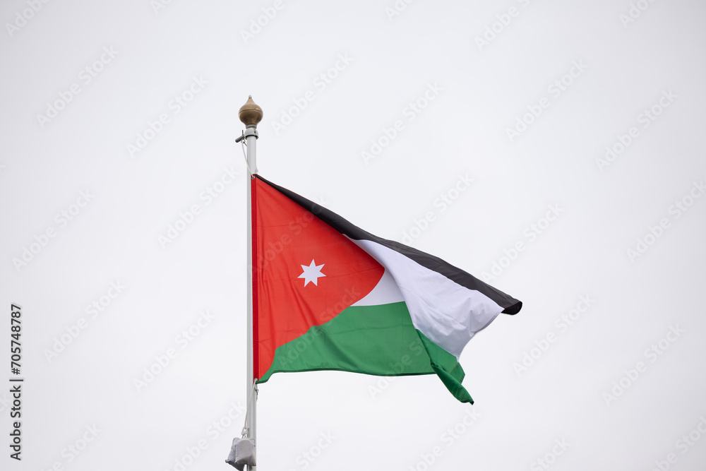 Large Jordan flag fluttering in the wind..Flag of the Jordanian Arab ...