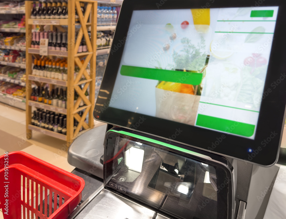 Customer pays his purchase at the supermarket,self checkout systems in ...
