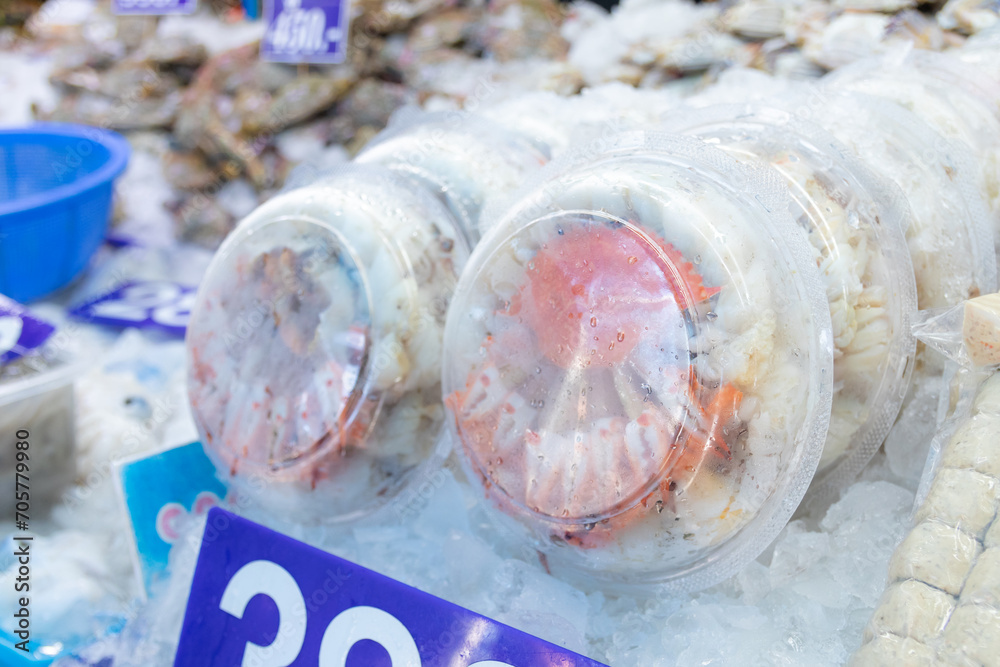 Frozen Steamed Crab pack in plastic box on ice at market. Stock Photo ...