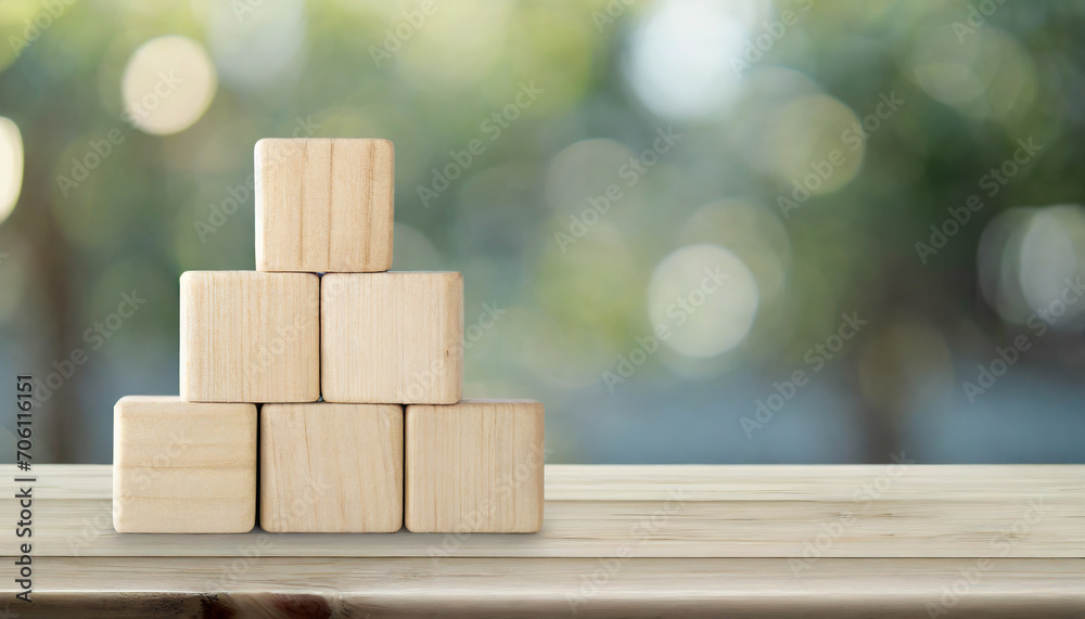 Neatly stacked wooden cubes on table with space for text/infographics ...