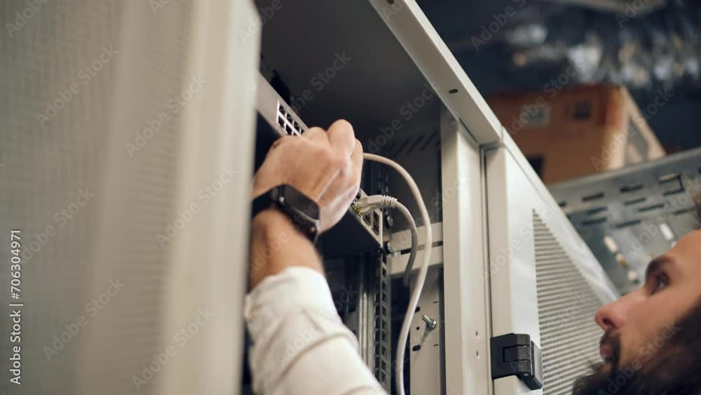 An engineer working on cluster console in an artificial intelligence ...