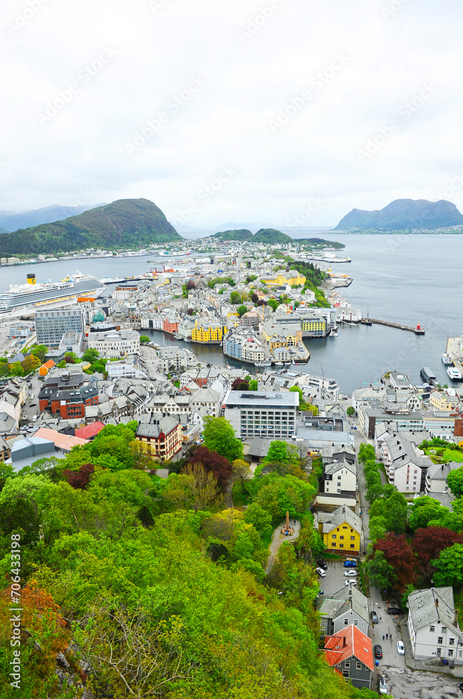 Vertical scenic view from the Aksla mountain of Alesund port city on ...