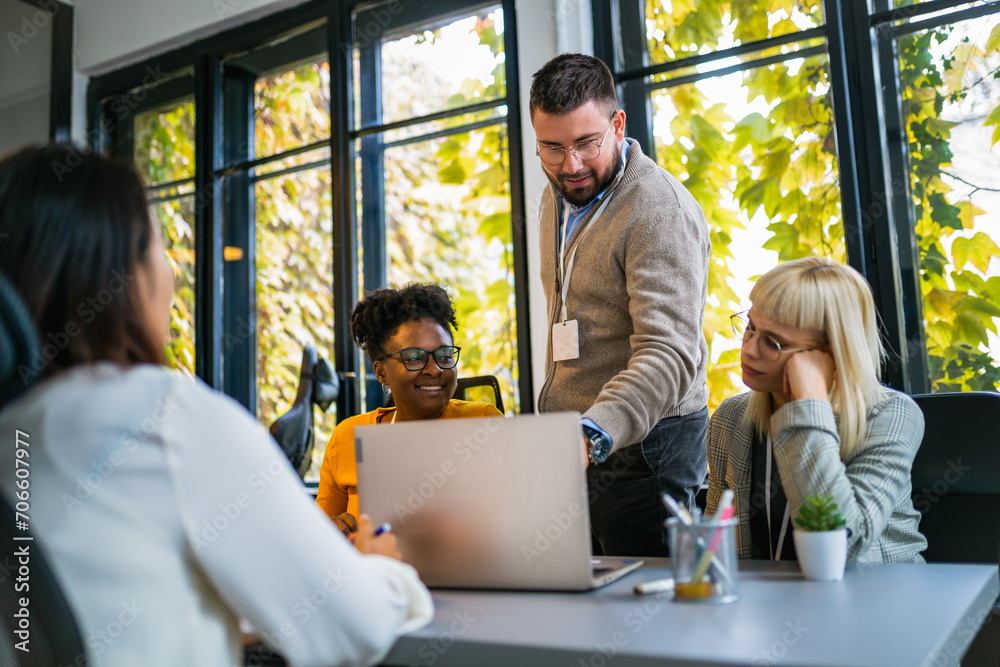 International workers group and team leader having teamwork discussion ...