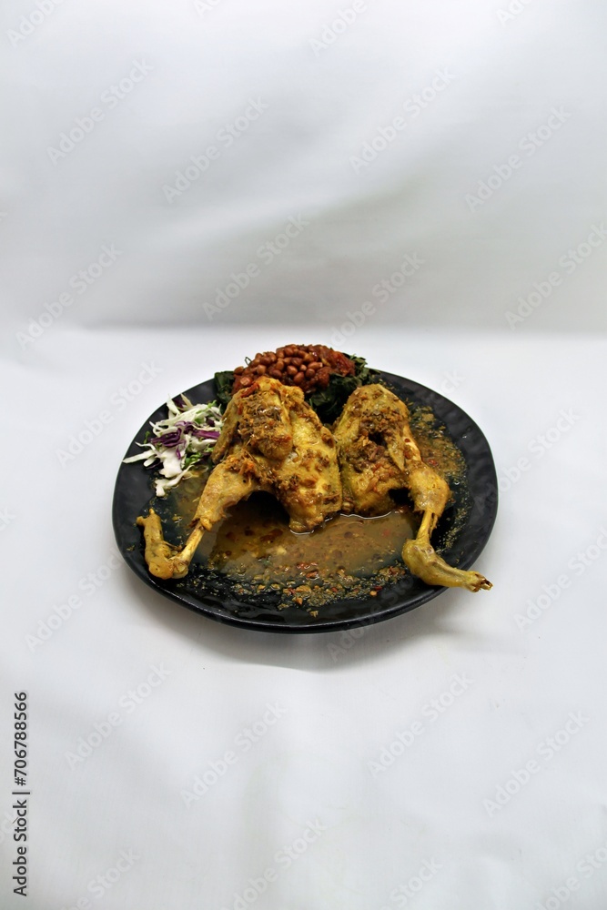 Balinese Indonesian food, Ayam Betutu. Whole chicken filled with ...