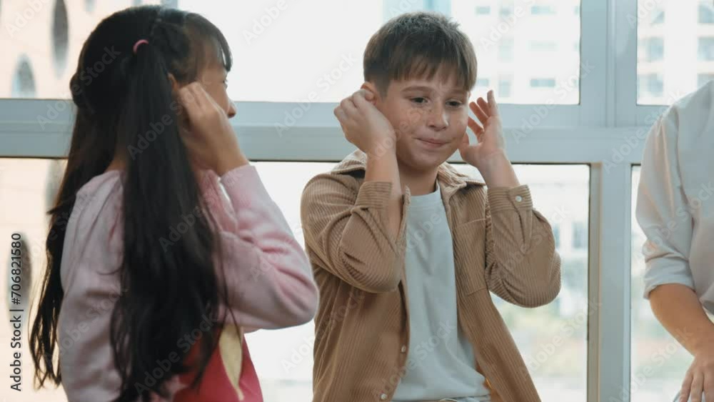 Diverse student learning about body organ while playing with teacher ...